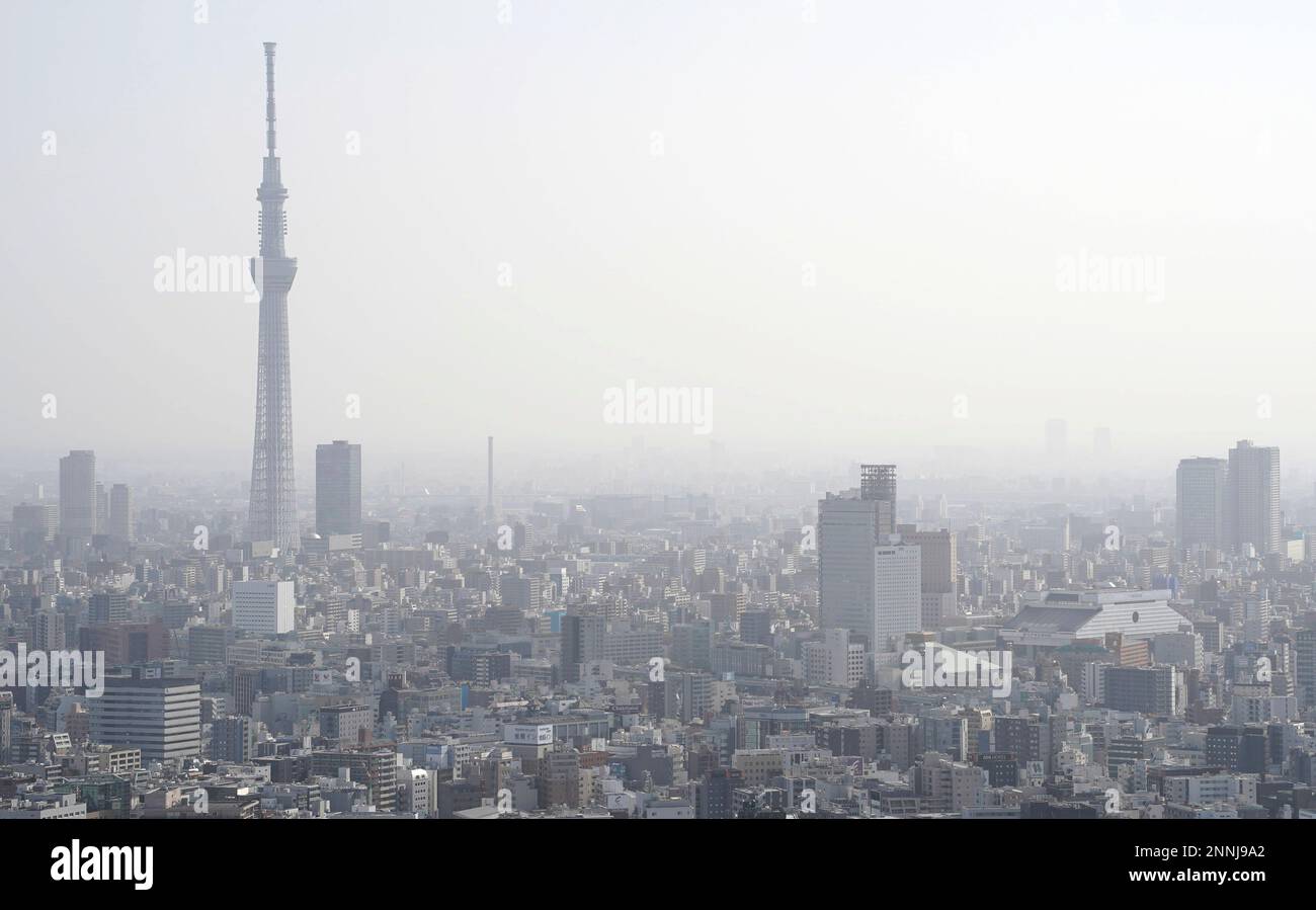 Yellow sand and dust covering the sky above city of Tokyo are pictured ...