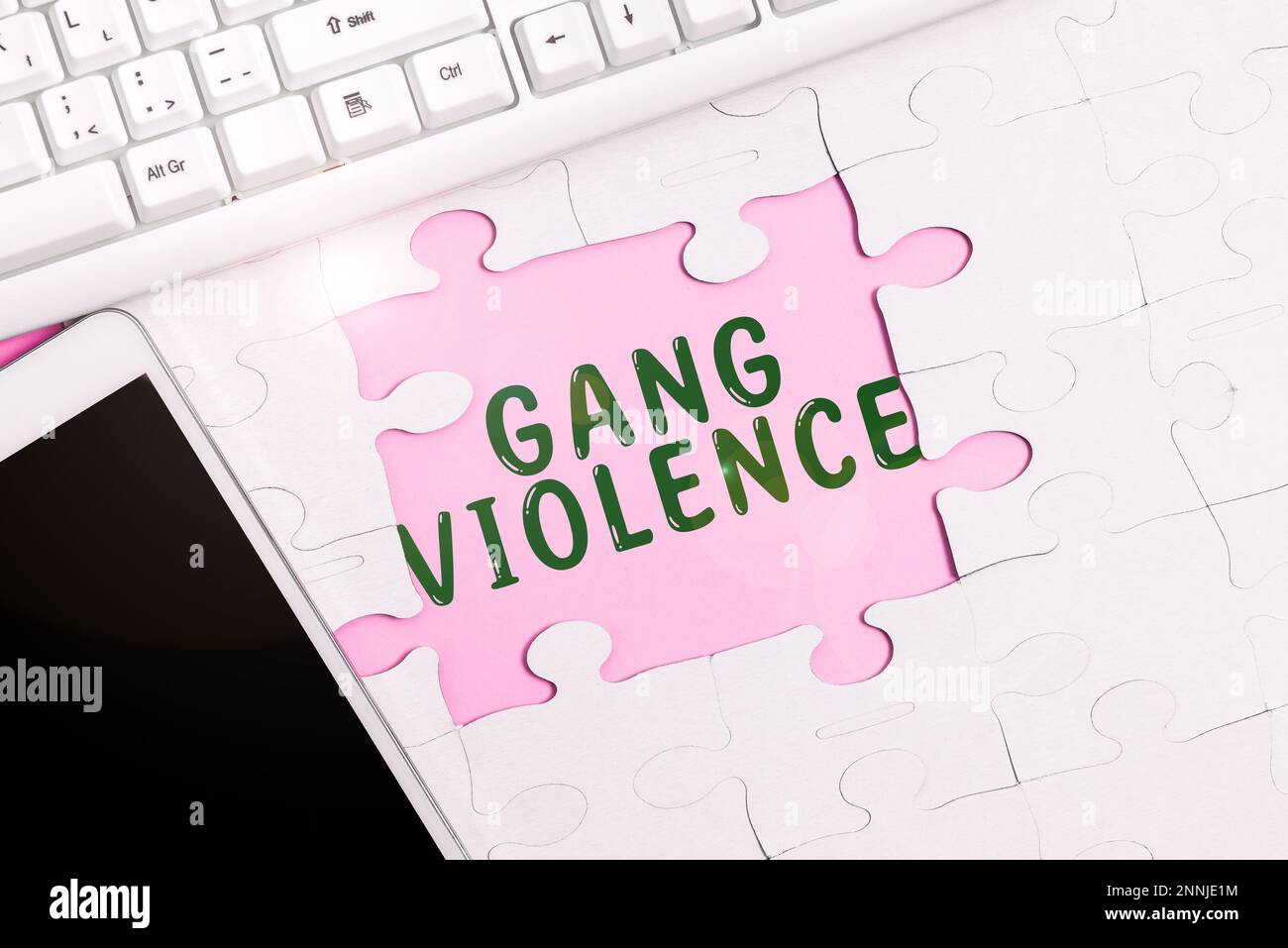 Hand writing sign Gang Violence. Word Written on infringement of the ...