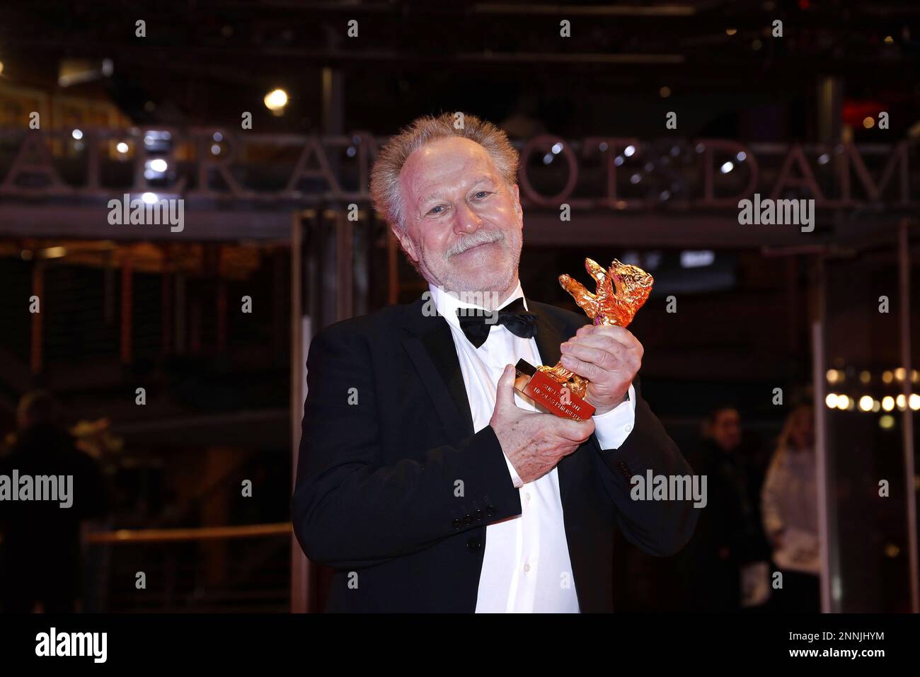 French Director Nicolas Philibert poses with the Golden Bear for Best ...