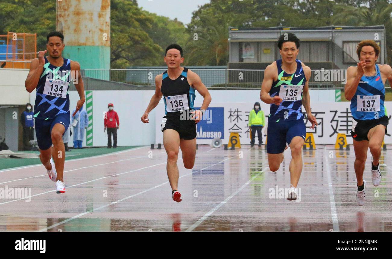 Japanese sprinter Asuka Cambridge (L) finishes the top during the men's ...