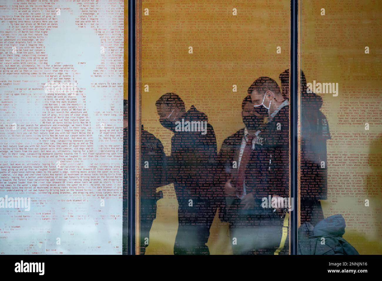 Text overlay on windows is seen as police investigate the Lynn Valley ...