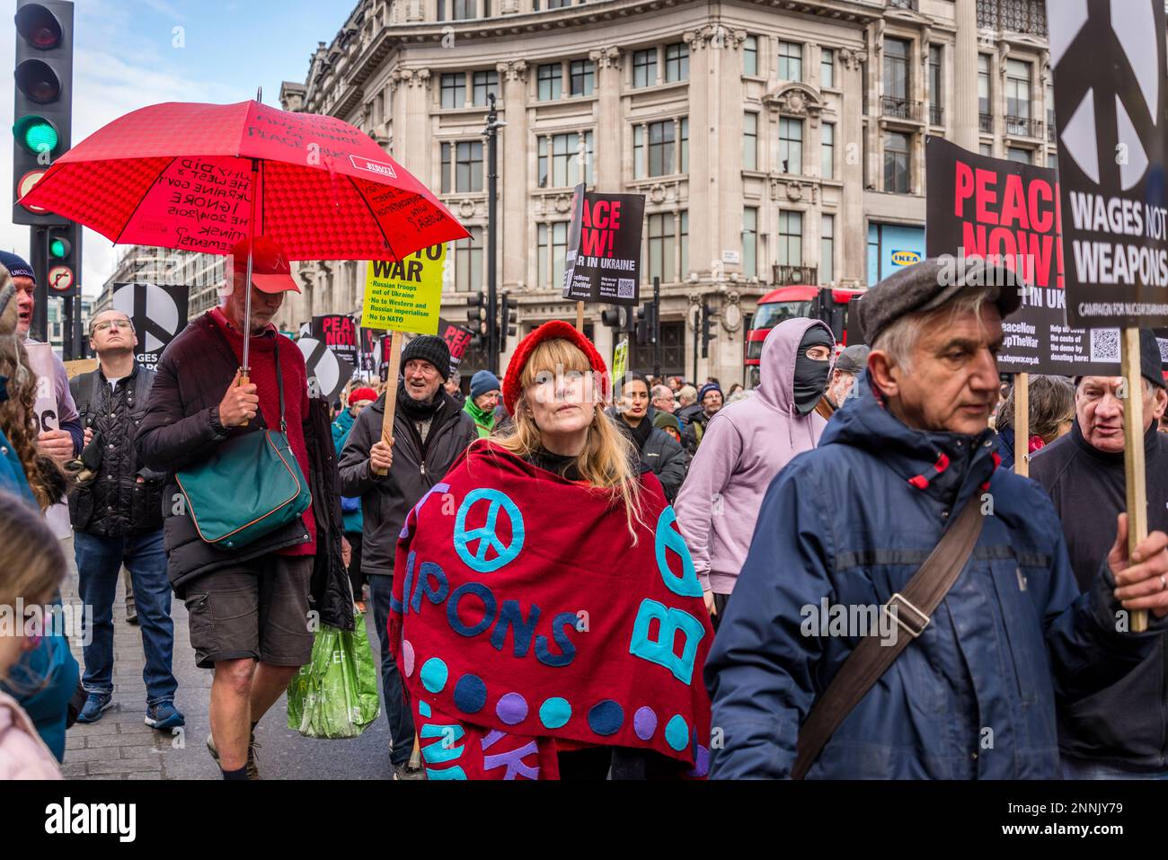 Woman with peace signs, Campaign for Nuclear Disarmament (CND) and Stop ...