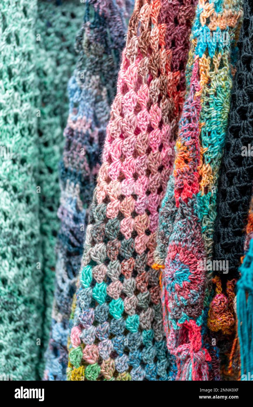 Background. Multicolored knitted handmade cloth pattern. Knitted ...