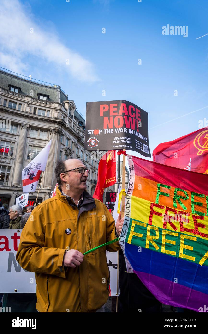 Free Assange banner, Campaign for Nuclear Disarmament (CND) and Stop ...