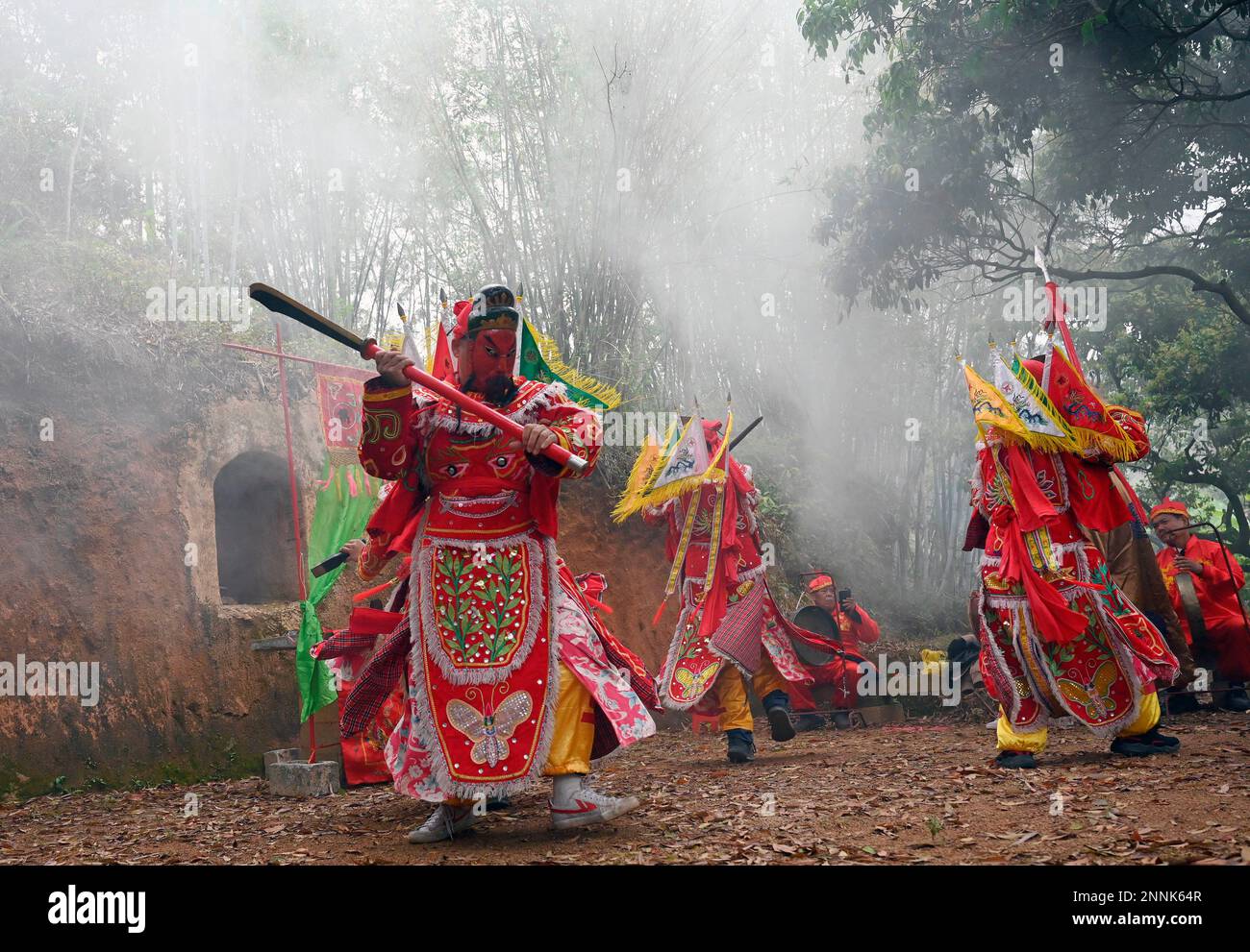 The farmers are dancing the traditional Nuo opera to pray for harvest in Qinzhou,Guangxi,China ...
