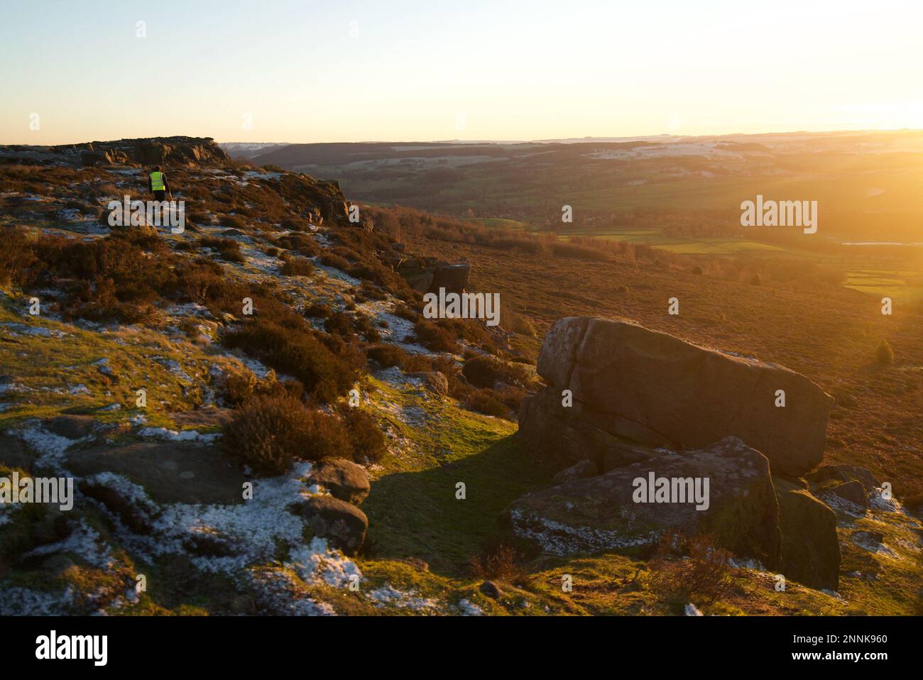 A man picking up litter in the Peak District, along Baslow Edge at ...