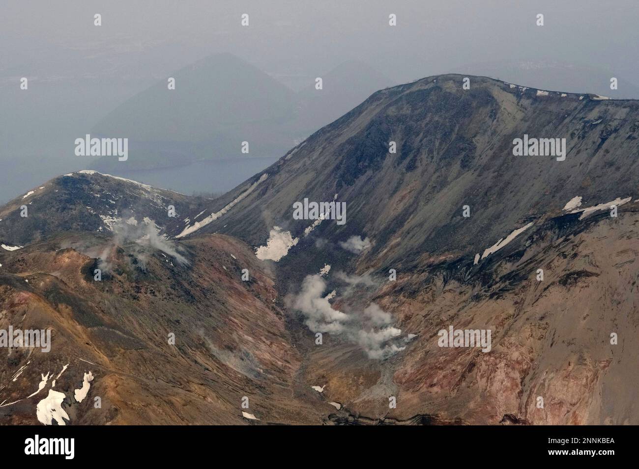 An aerial photo shows Mt. Usu in Hokkaido Prefecture on March 24, 2021 ...