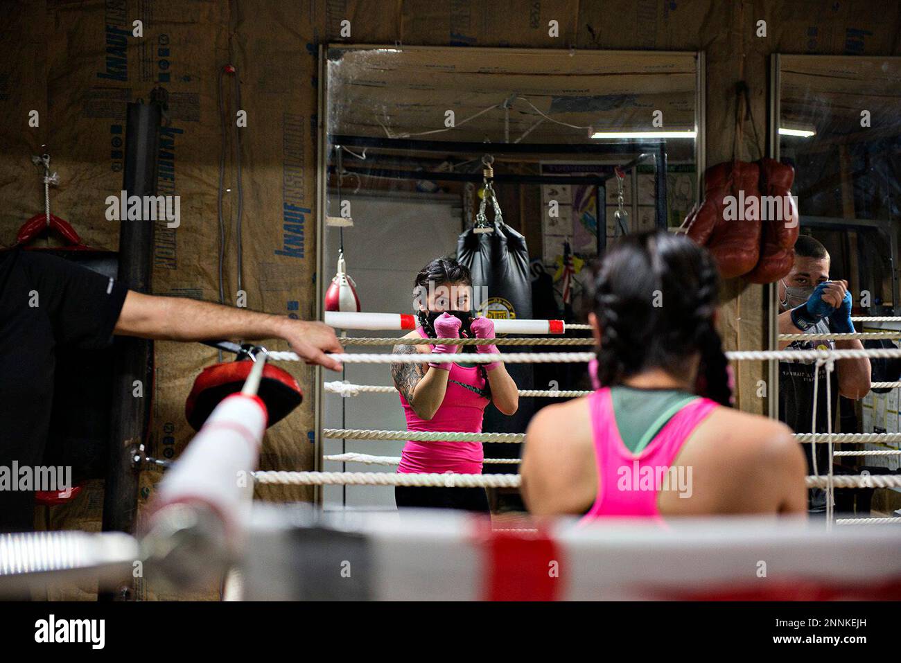 Boxers Lesley Cadenas-Garcia and Xavier Cavazos work on their form ...