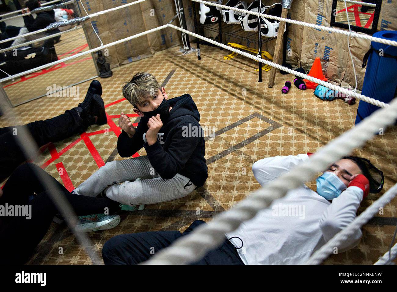 Louis Muniz works on his sit-ups during class. Along with getting in ...