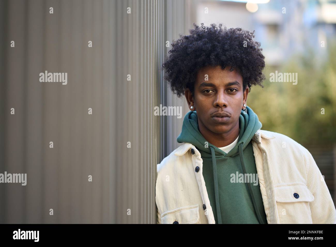Cool confident young gen z hipster African American guy outdoors ...