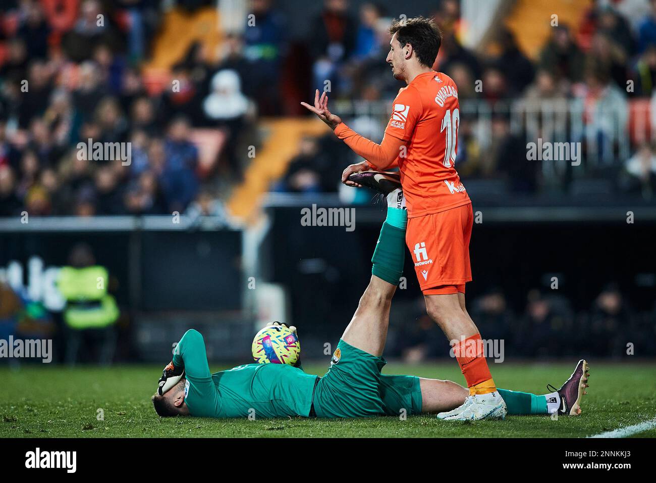 Mikel Oyarzabal of Real Sociedad and Giorgi Mamardashvili (Valencia CF ...