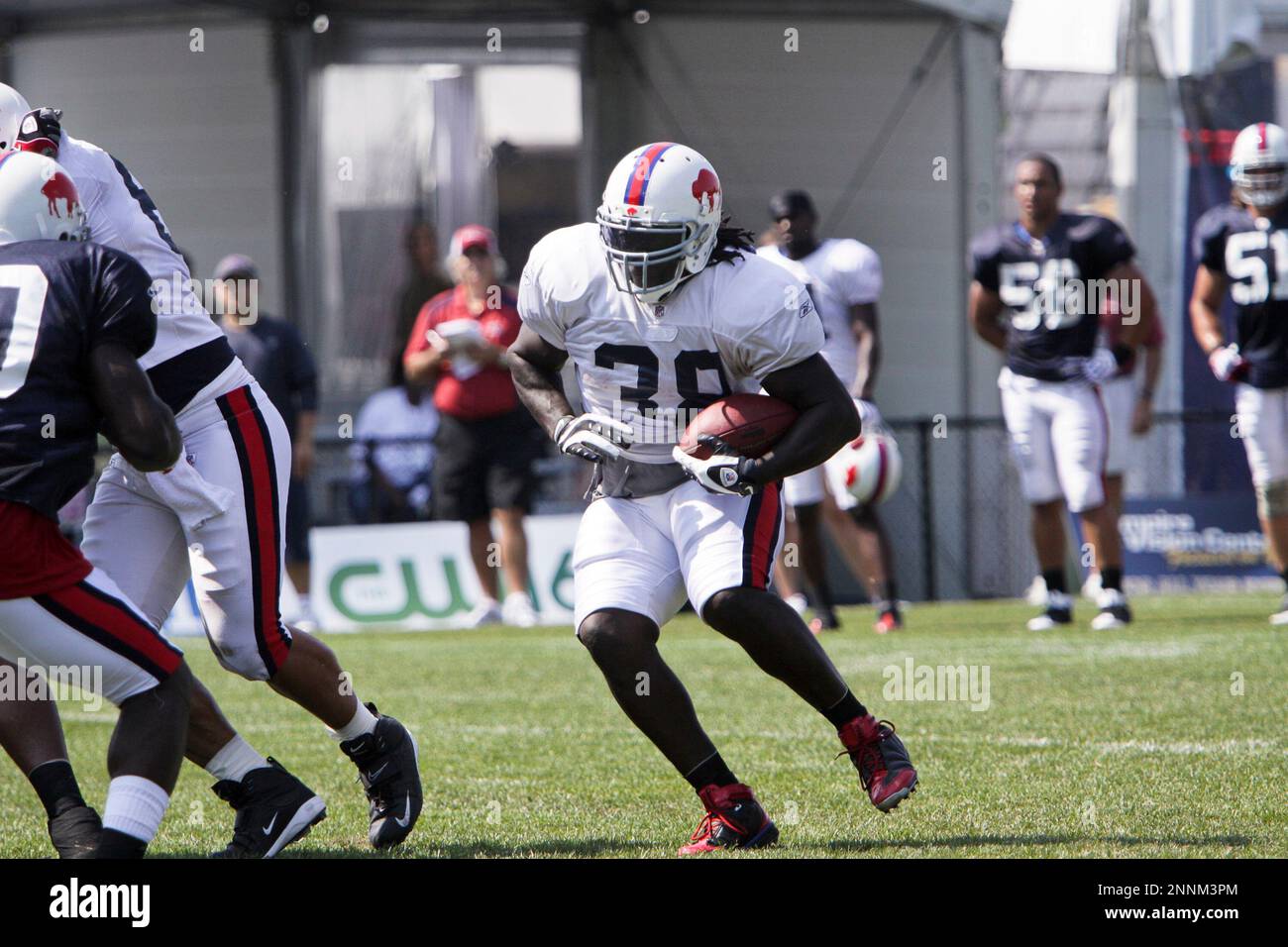 03 August 2009: Buffalo Bills running back Corey McIntyre run through ...