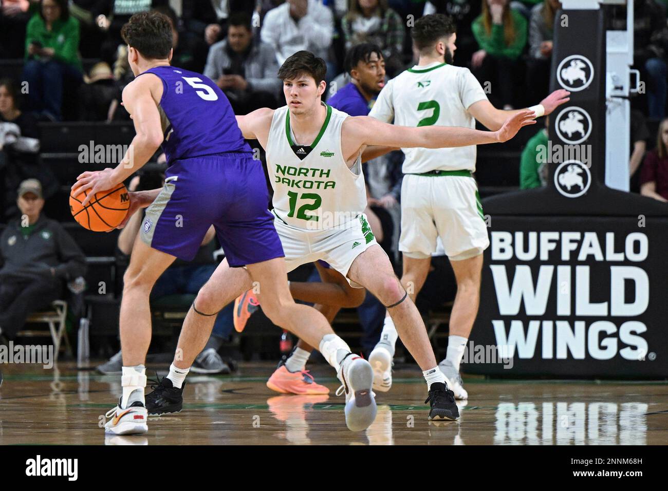 North Dakota Fighting Hawks forward Brian Mathews (12) guards St ...