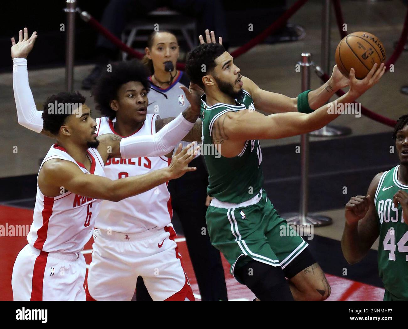 Boston Celtics forward Jayson Tatum (0) drives to the basket past ...