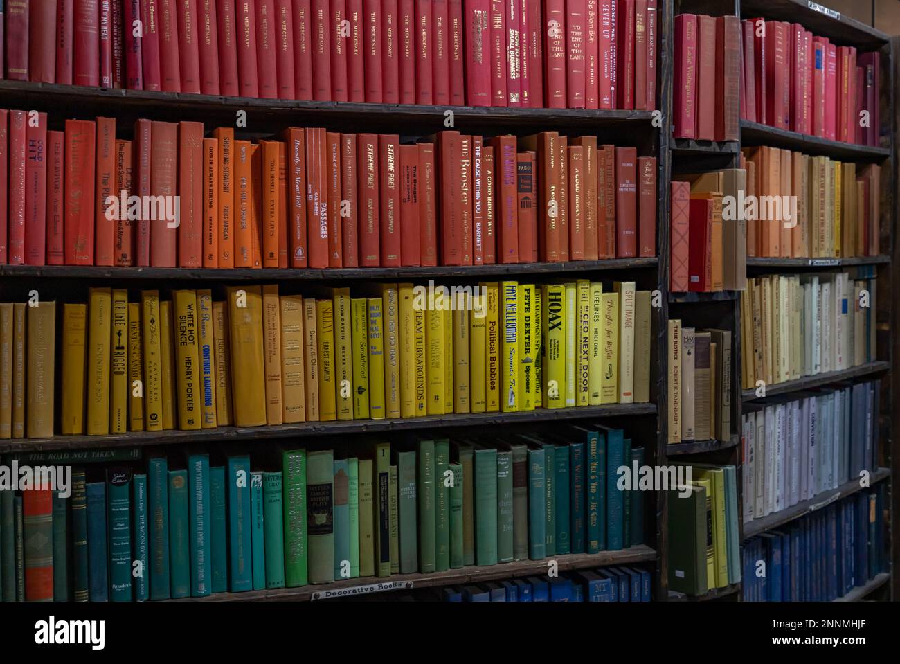 A picture of a color coded bookshelf inside The Last Bookstore Stock ...