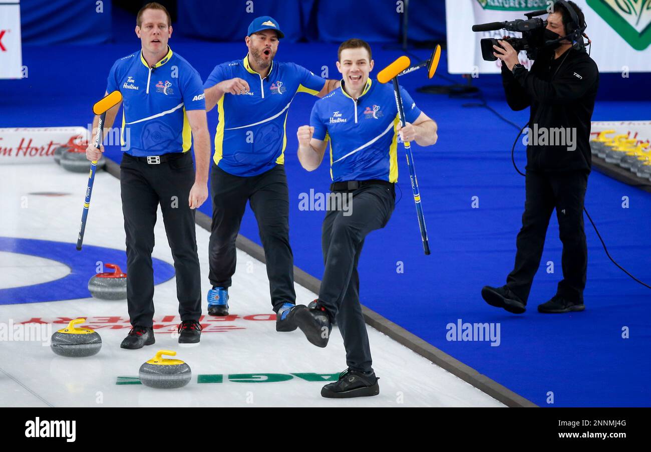 Team Alberta, left to right, lead Karrick Martin, second Brad Thiessen ...