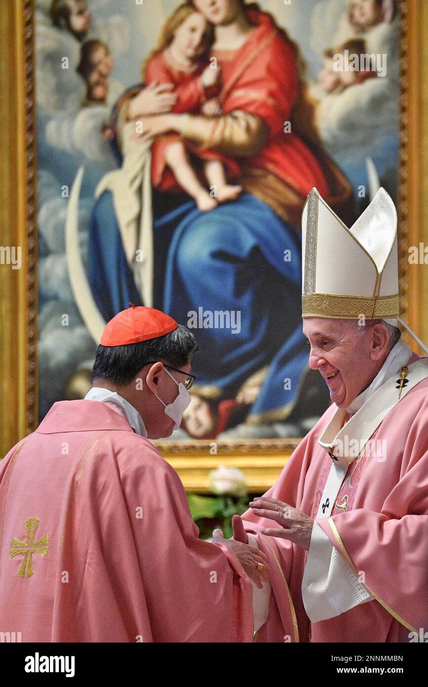 Pope Francis, right, greets Philippine Cardinal Luis Antonio Tagle as ...