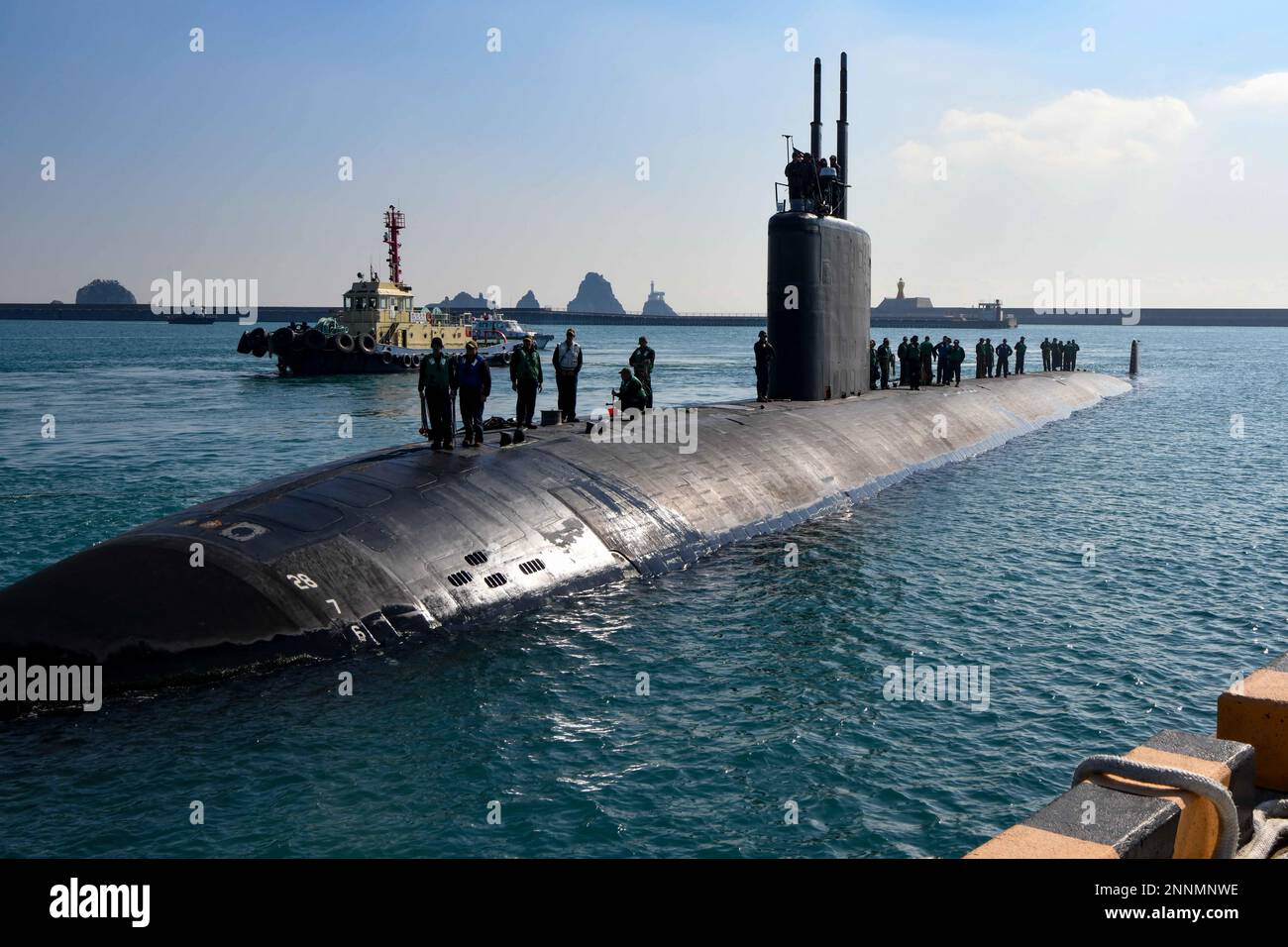 BUSAN, Republic of Korea (Feb. 23, 2023) Tugboats assist the Los ...