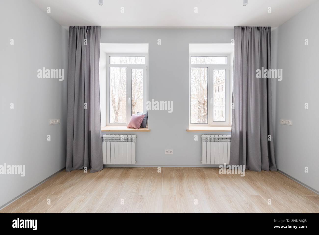 Empty gray room ready for people to move in Stock Photo - Alamy