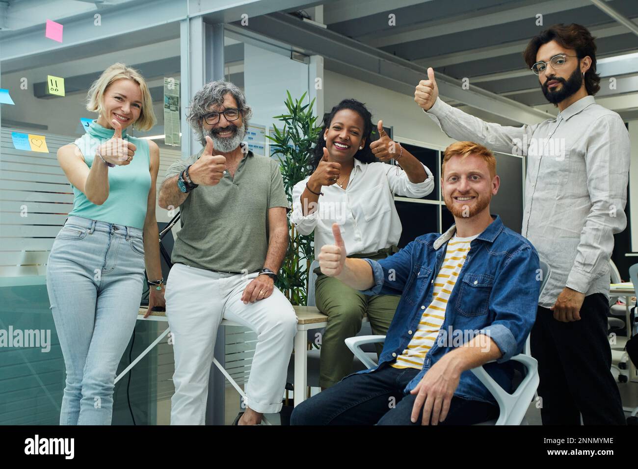 Portrait of confident multiracial professional business people team ...