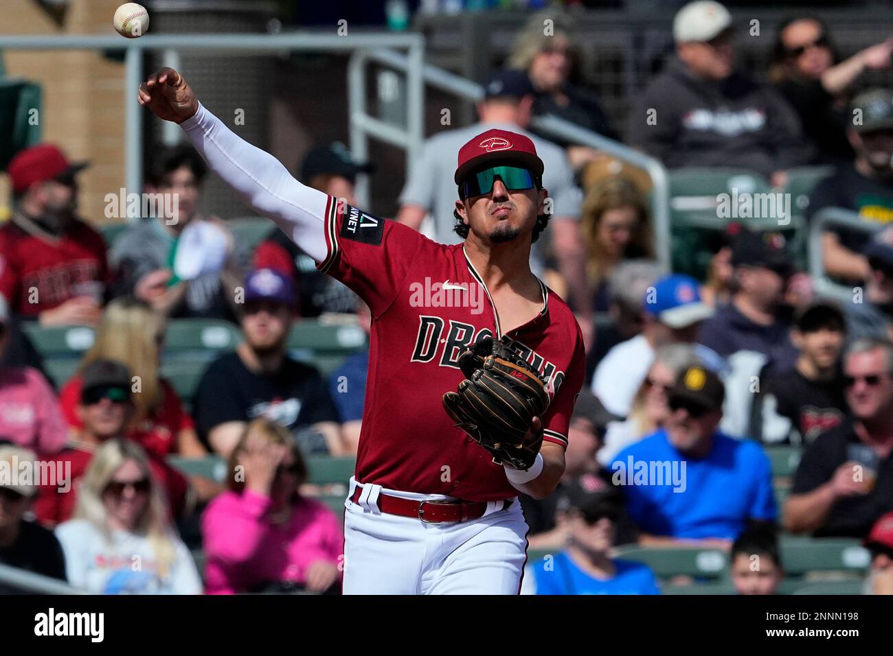 Arizona Diamondbacks' Josh Rojas warms up during the first inning of a ...