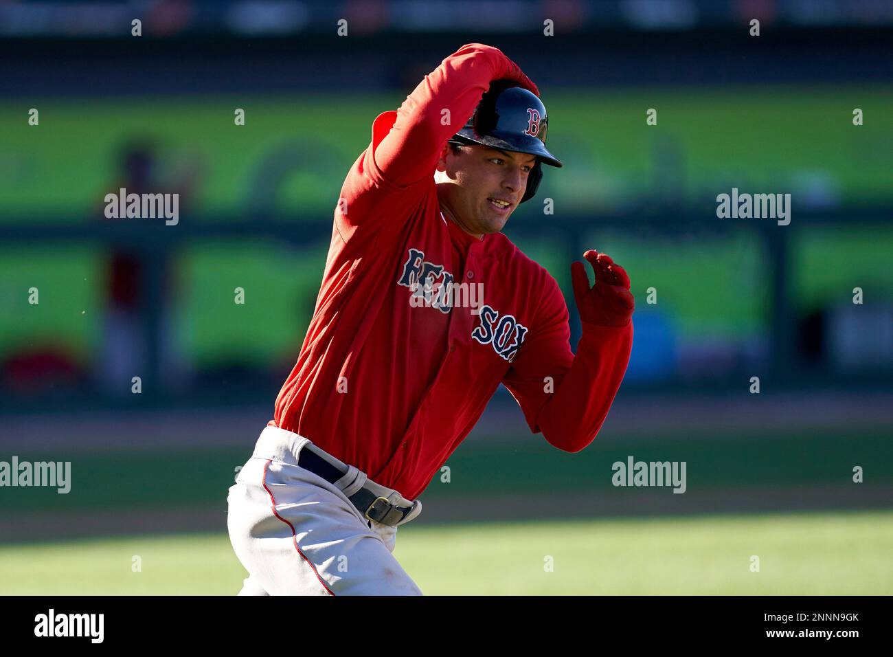 Boston Red Sox Nick Yorke (80) keeps his helmet from falling off as he ...
