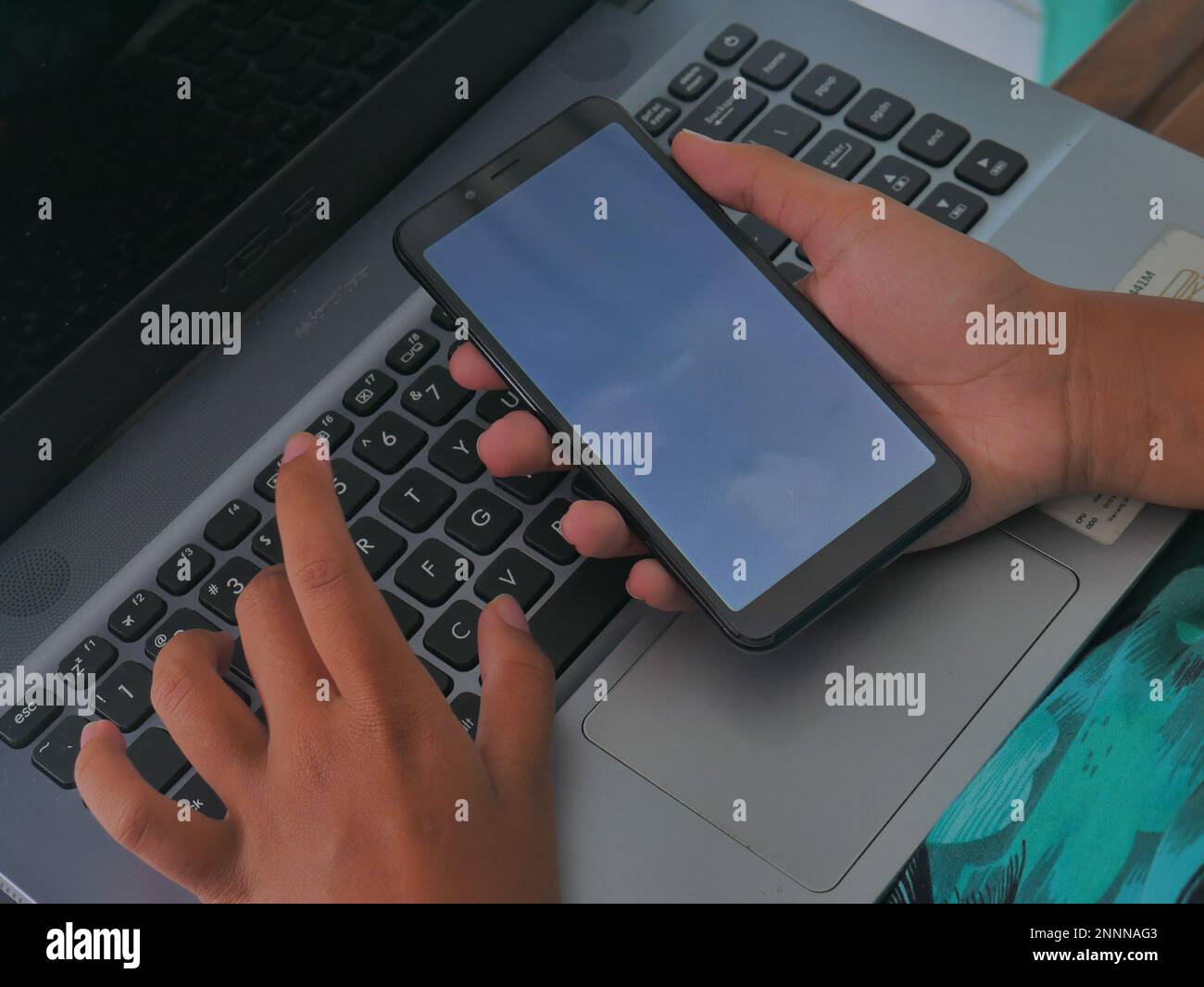 close up of smartphone and google search engine to find information ...