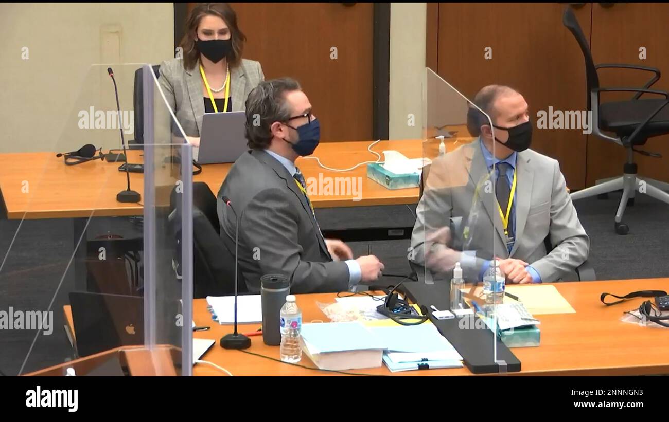 In this image from video, defense attorney Eric Nelson left, and ...