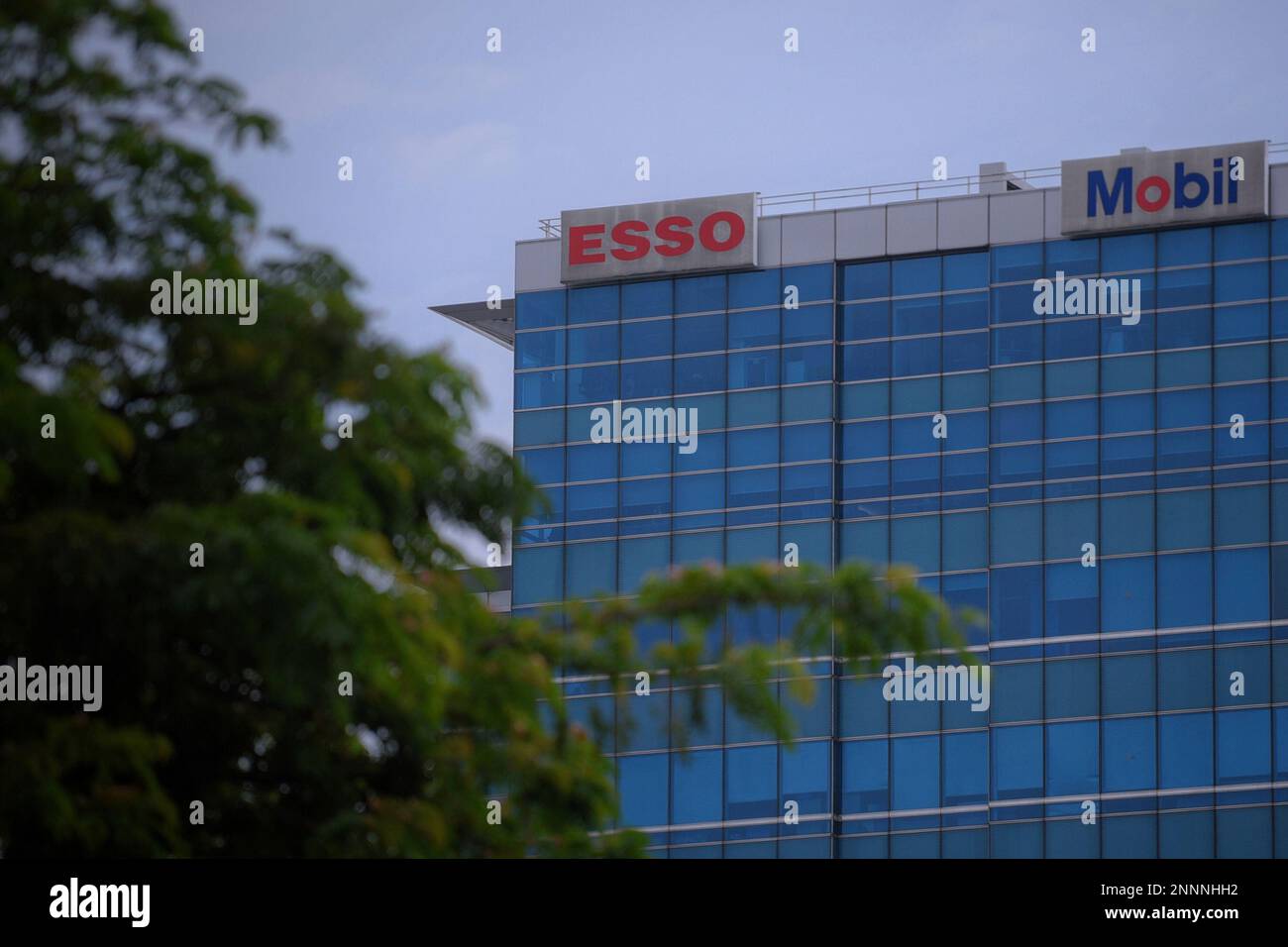The Esso and Mobil signage seen outside the ExxonMobil corporate office ...