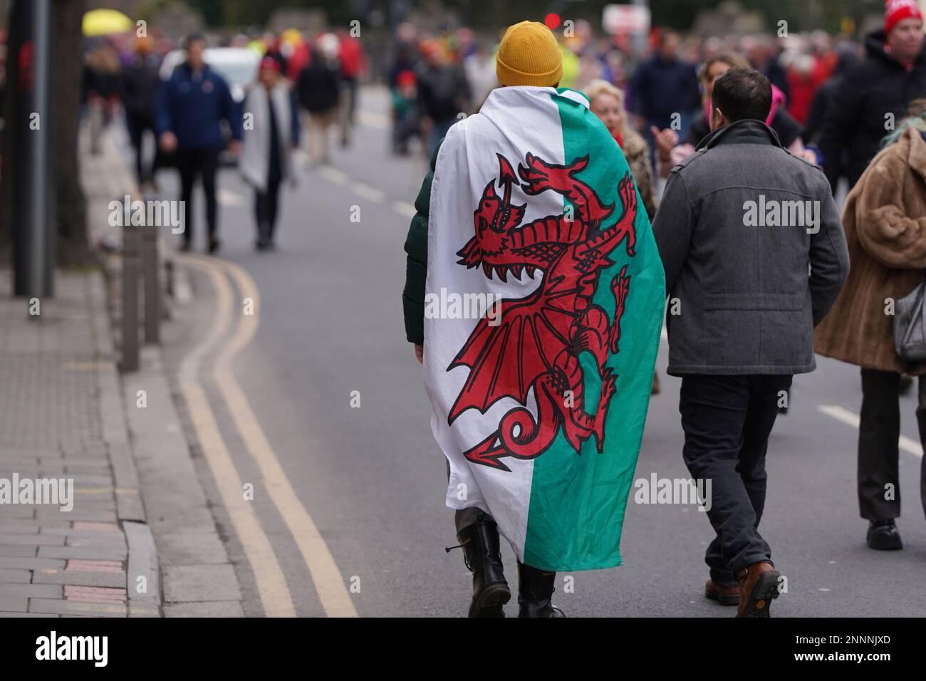 Wales and England fans draped in national flags in Cardiff before the ...