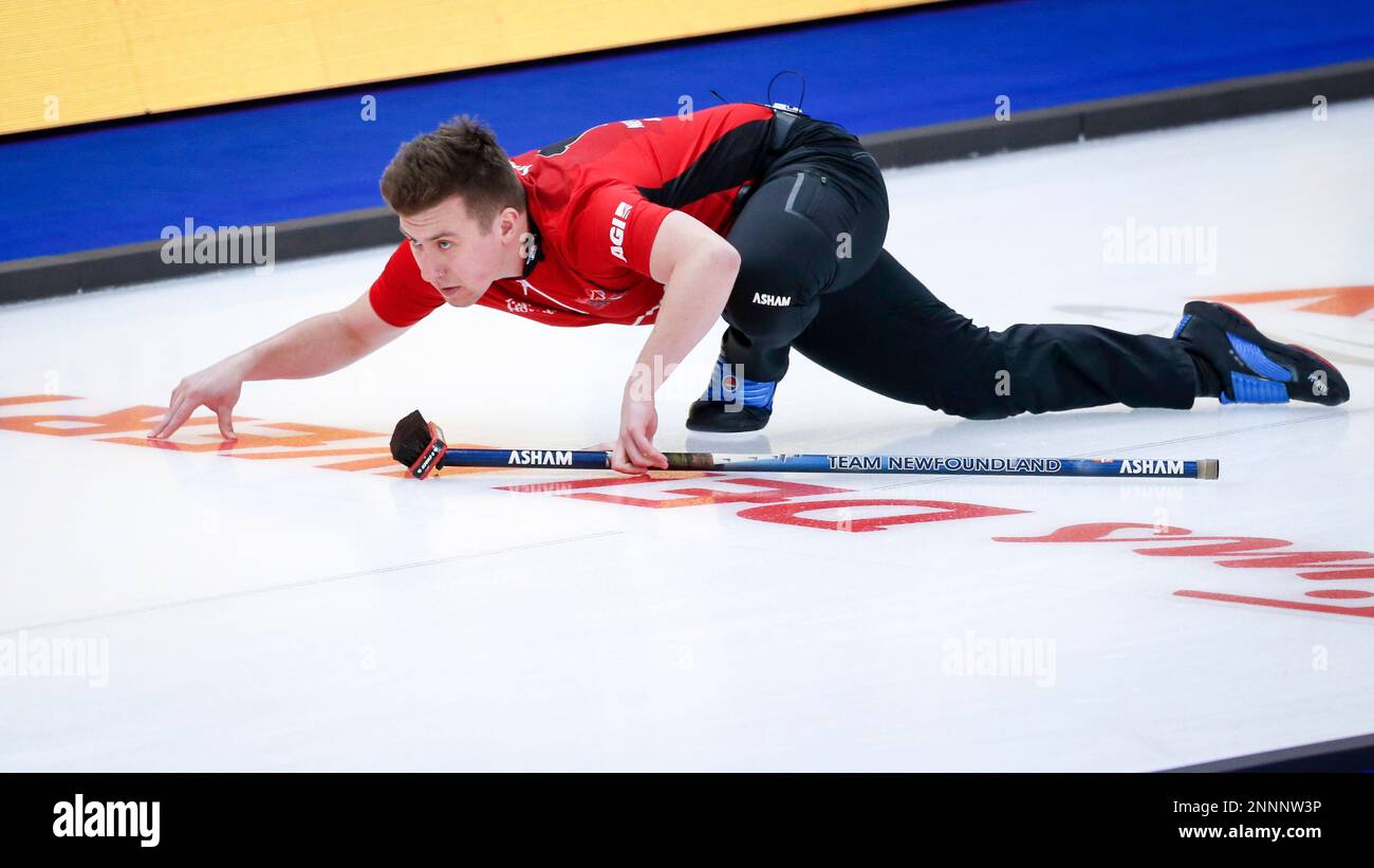 Team Newfoundland and Labrador skip Greg Smith directs his team as he ...