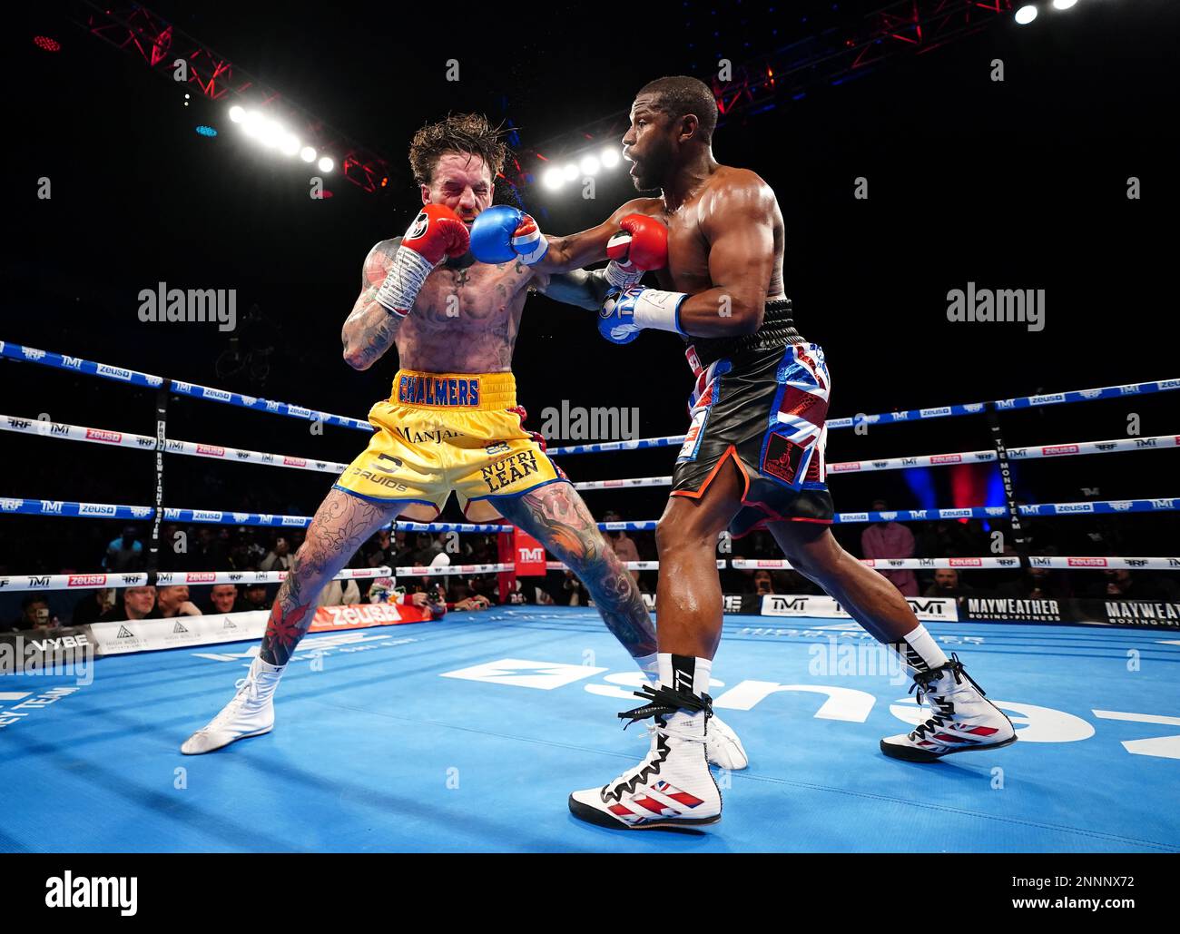 Aaron Chalmers (left) and Floyd Mayweather during their exhibition ...