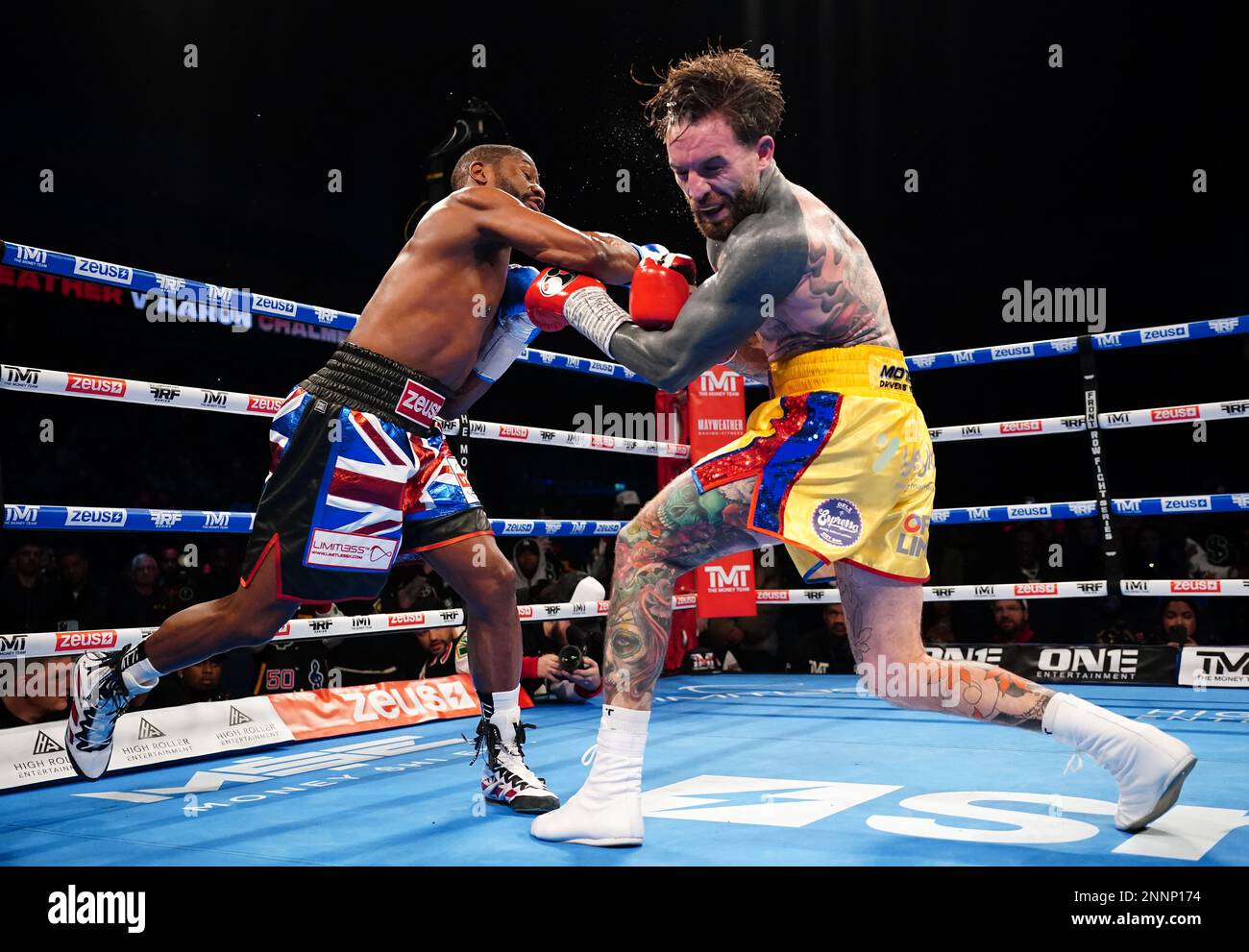 Floyd Mayweather (left) and Aaron Chalmers during their exhibition ...