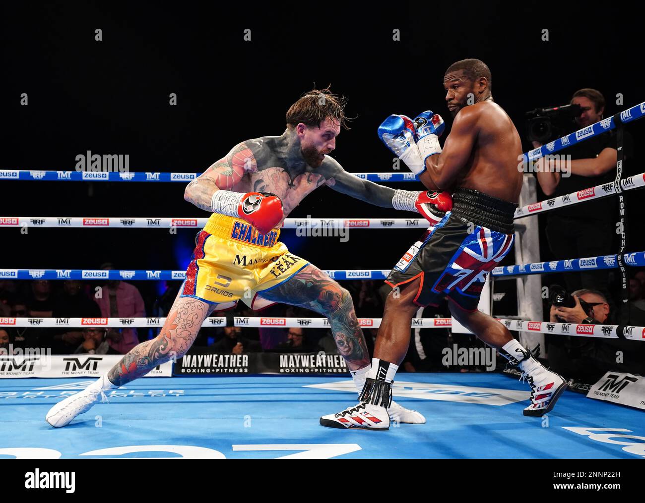 Aaron Chalmers (left) and Floyd Mayweather during their exhibition ...