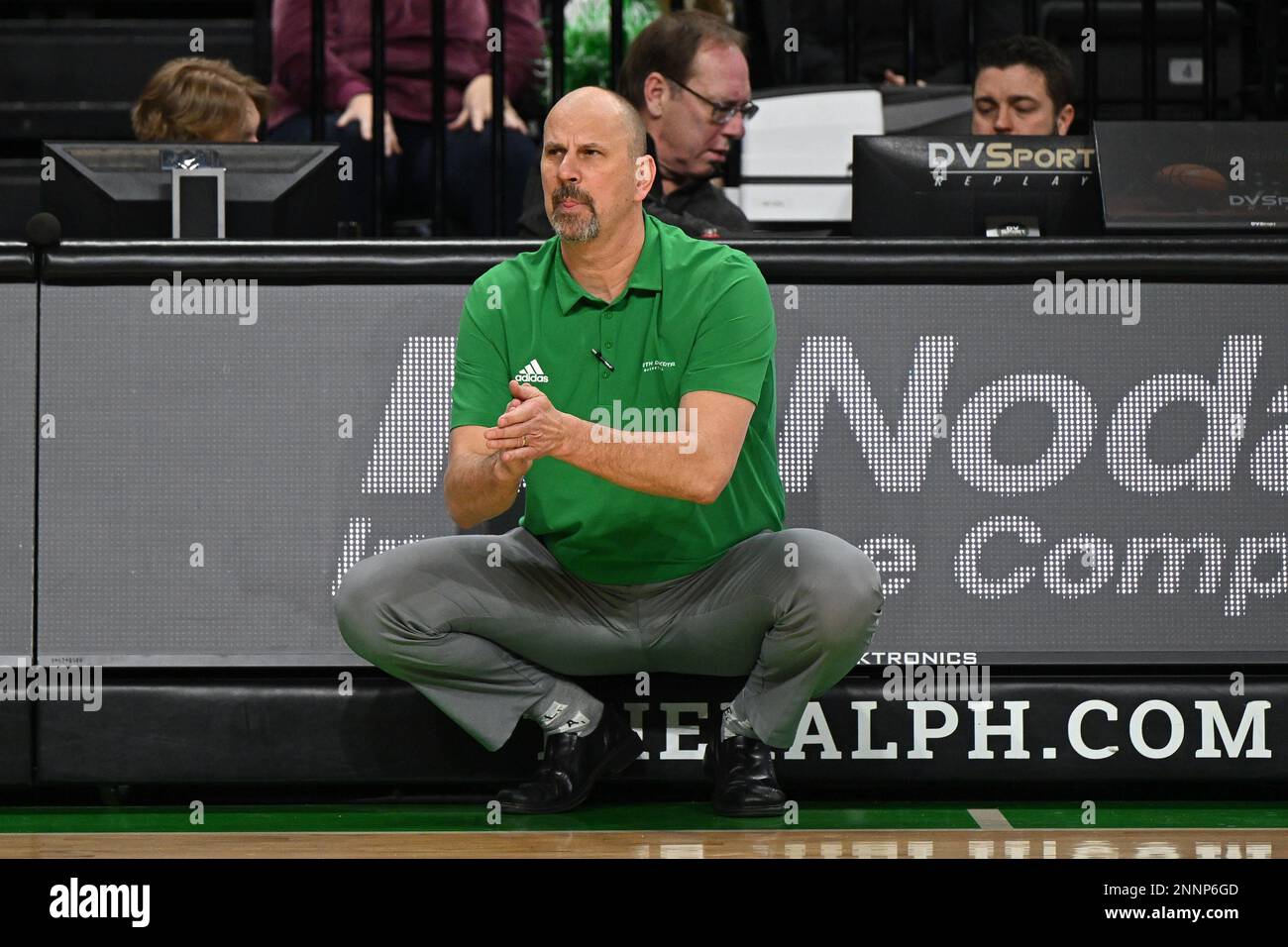 North Dakota Fighting Hawks head coach Paul Sather watches the play on ...