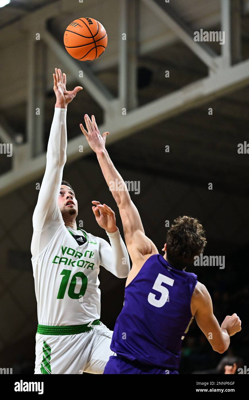 North Dakota Fighting Hawks forward Tsotne Tsartsidze (10) shoots over St. Thomas - Minnesota ...