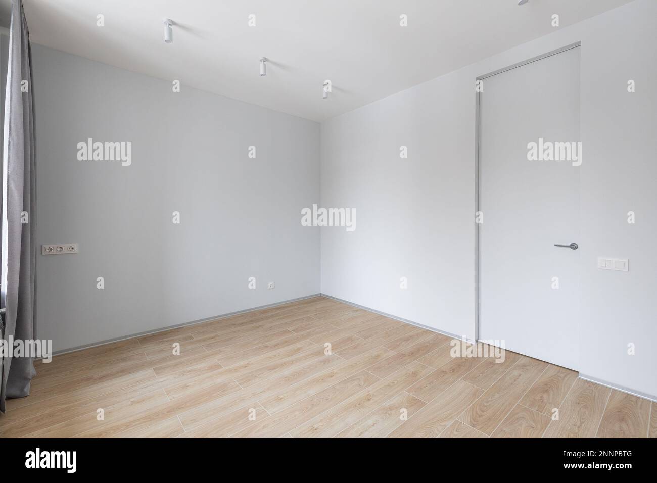 Empty gray room ready for people to move in Stock Photo - Alamy