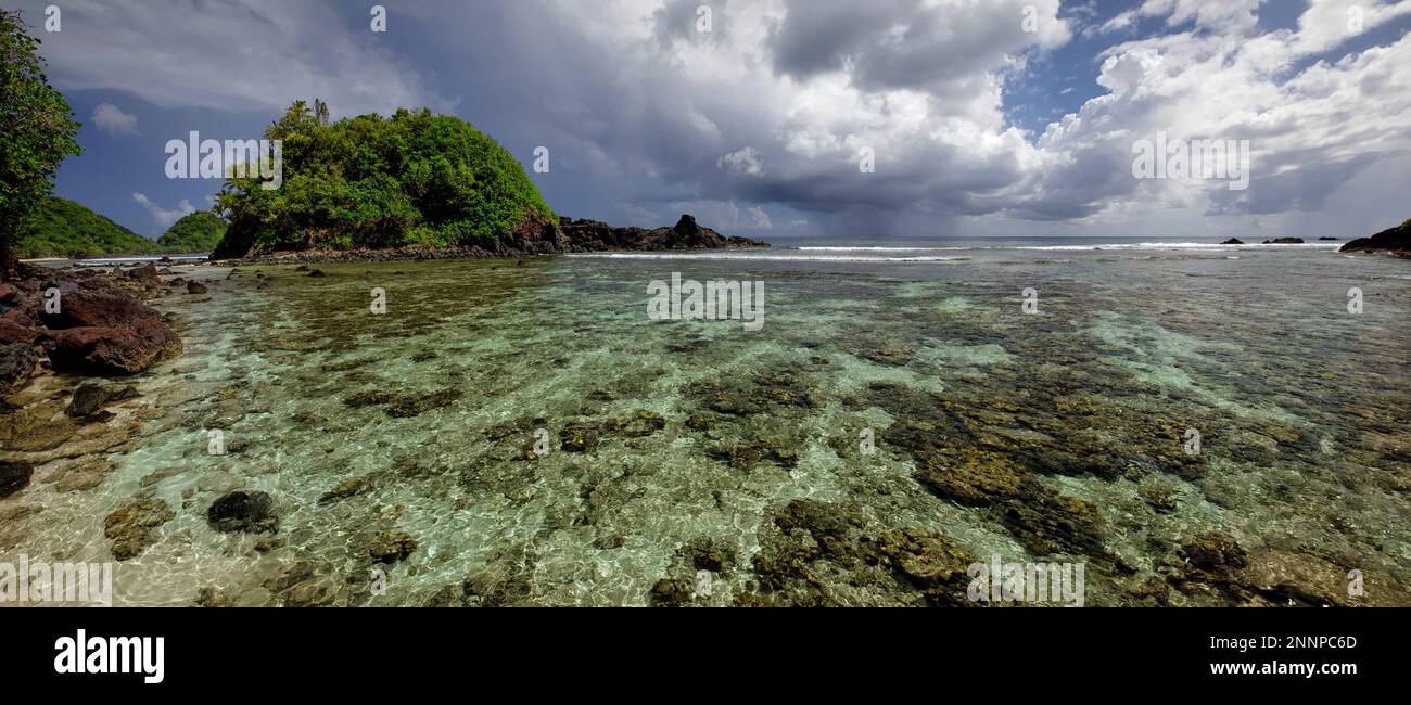 The clear waters along the coastline of Amanave on the island of ...