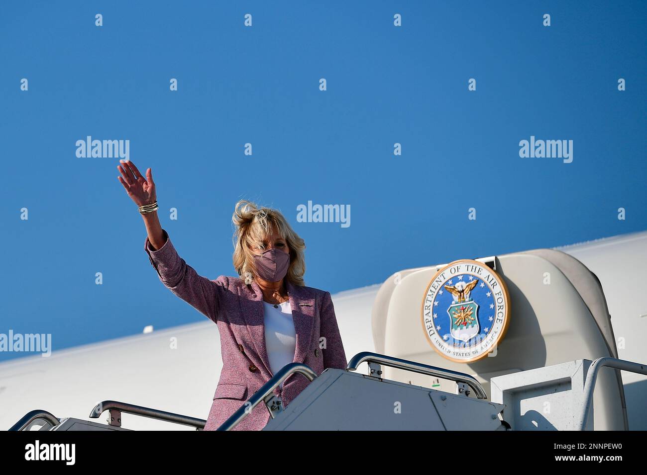 First lady Jill Biden waves as she arrives at Erie International ...