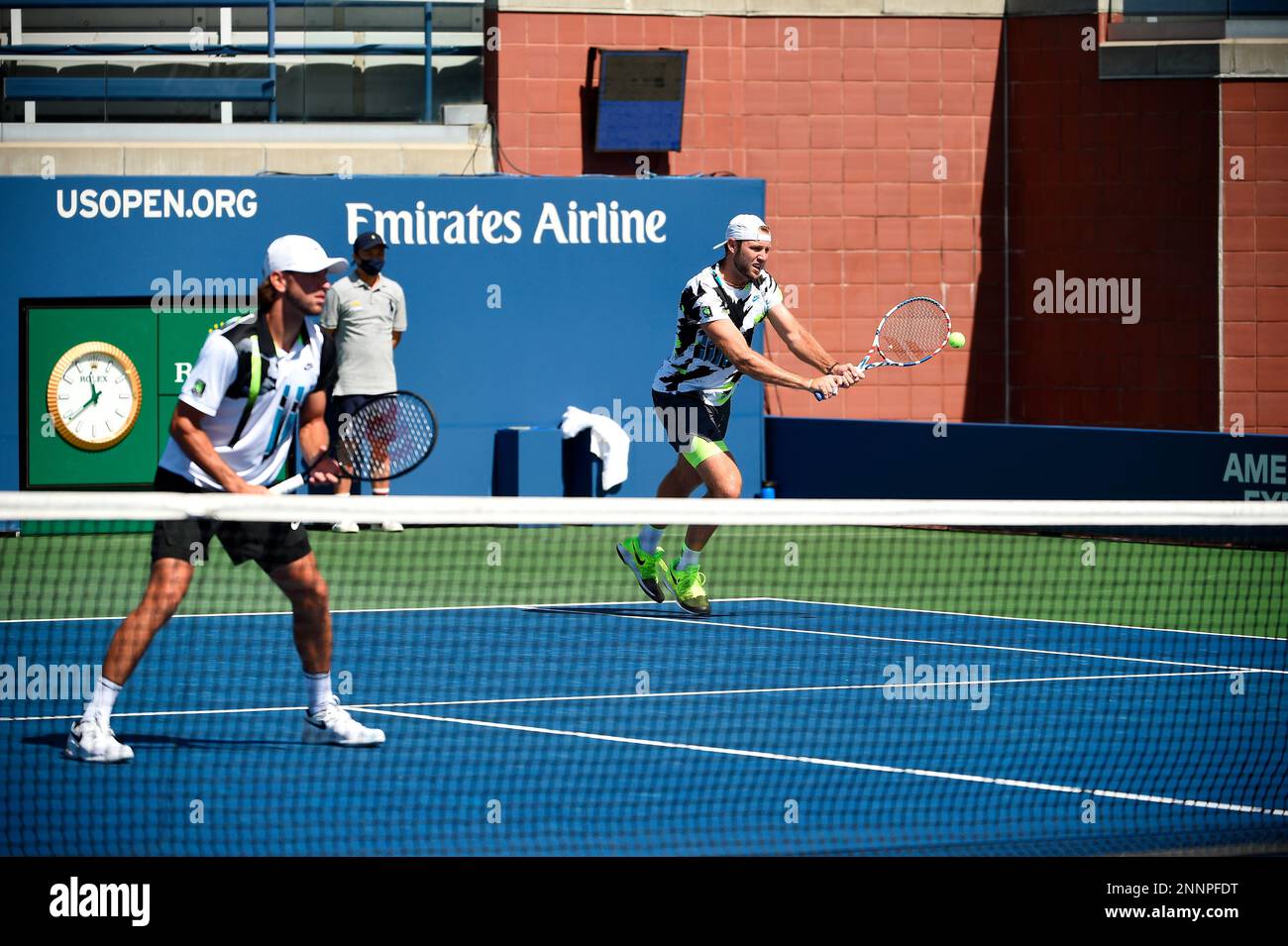 Jack Sock and Jackson Withrow in action against Mate Pavic and Bruno Soares during a men's ...