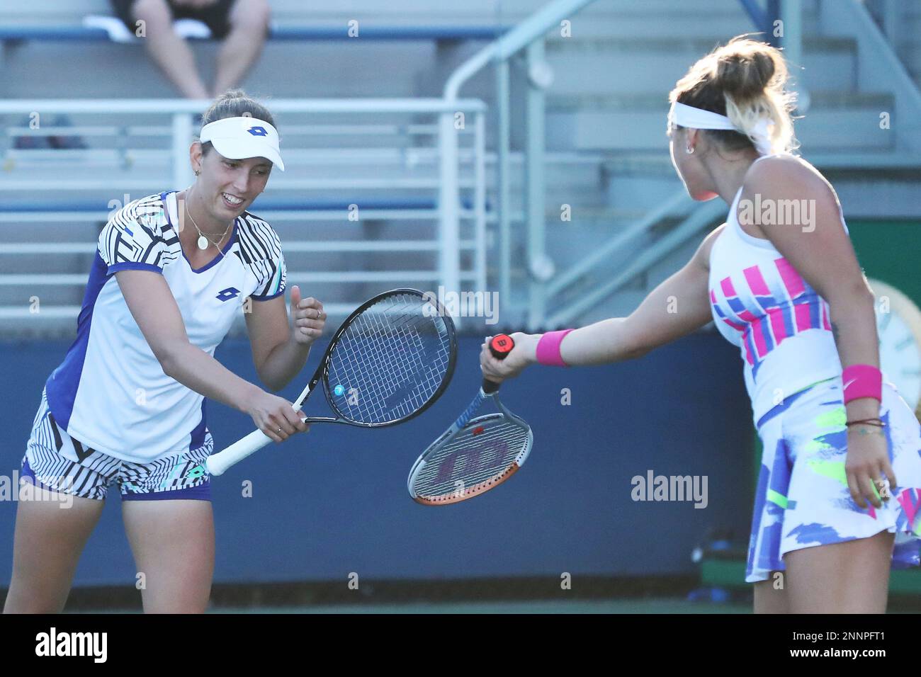 Elise Mertens and Aryna Sabalenka in action against Jessica Pegula and ...