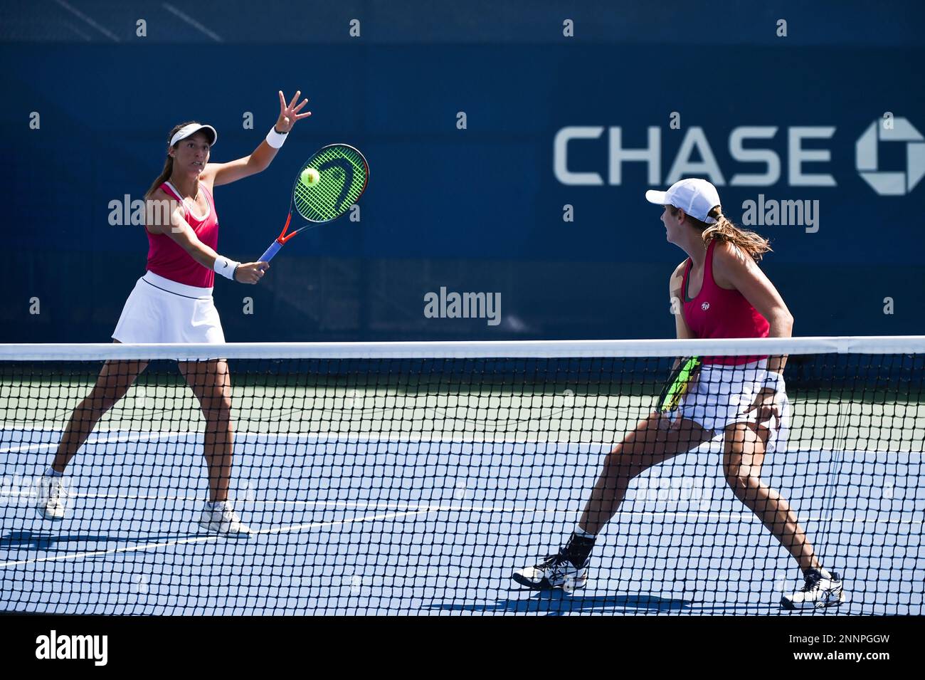 Hayley Carter and Luisa Stefani in action against Shuko Aoyama and Ena ...