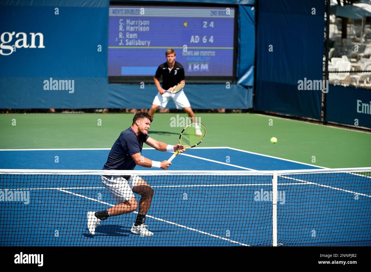 Christian Harrison and Ryan Harrison in action against Rajeev Ram and ...