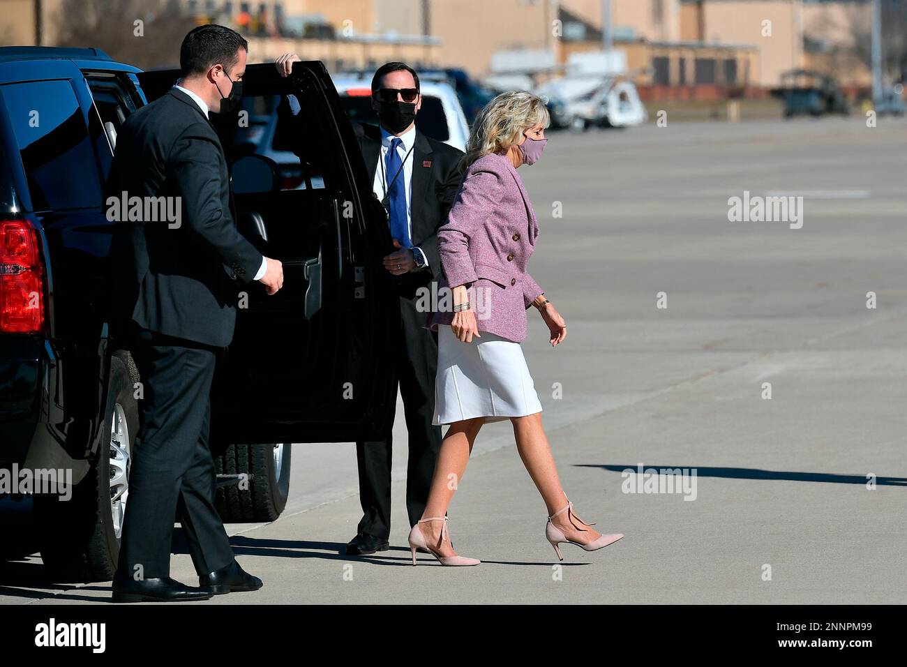 First lady Jill Biden walks to board a flight at Andrews Air Force Base ...