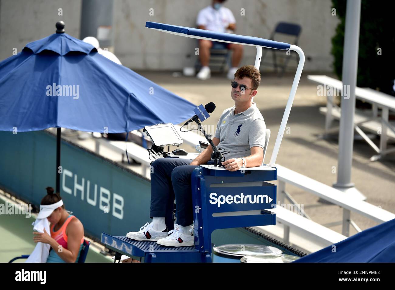 A chair umpire during a women's doubles match between Jennifer Brady ...