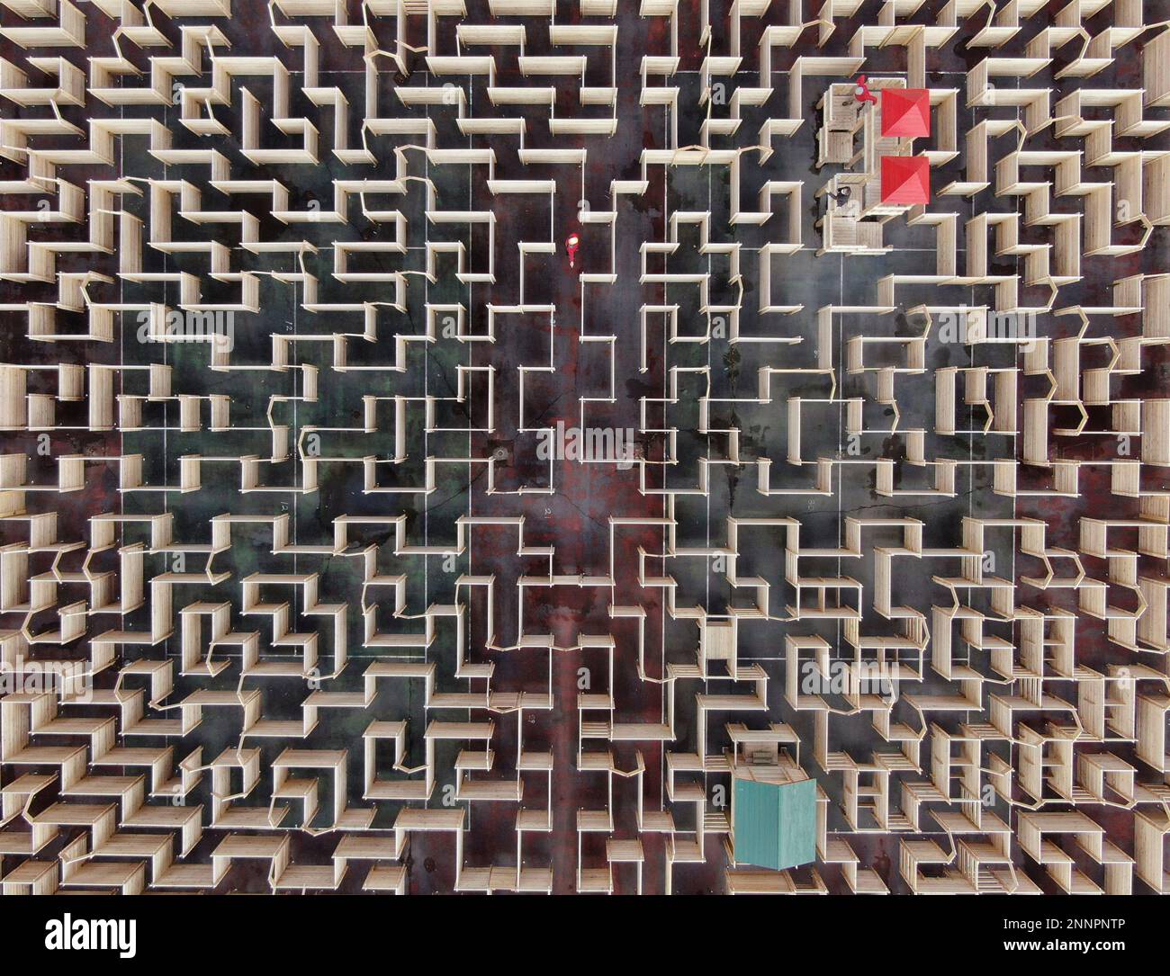 A photo shows a giant wooden maze at a tennis court of Ayabe Hot Spring ...