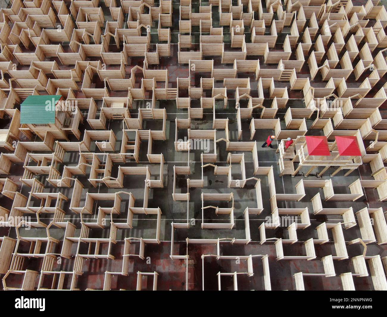 A photo shows a giant wooden maze at a tennis court of Ayabe Hot Spring ...