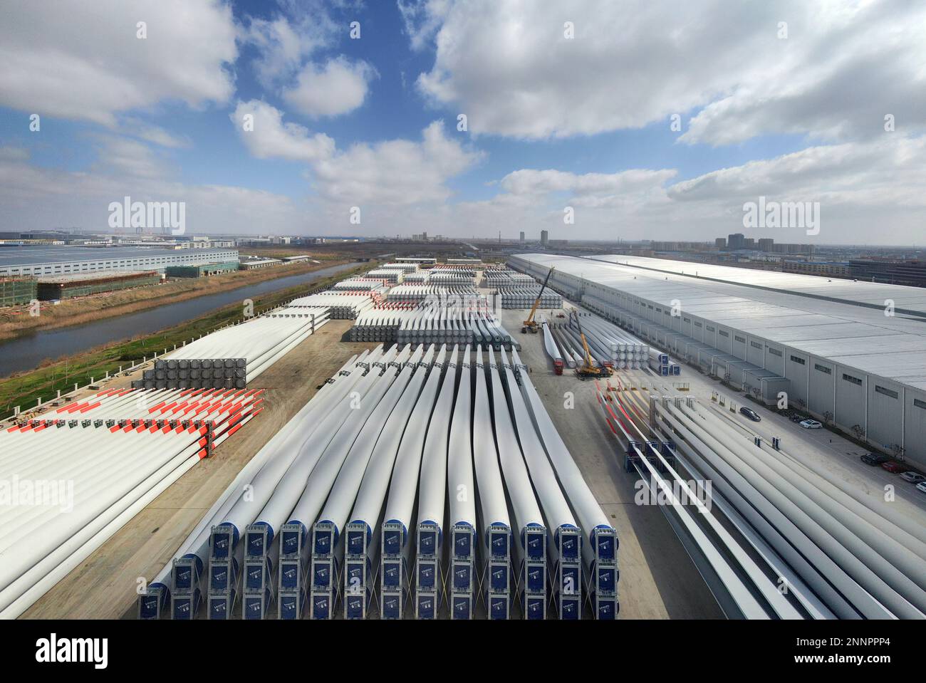 A view of wind turbine blades to be delivered at a factory in Haimen in ...
