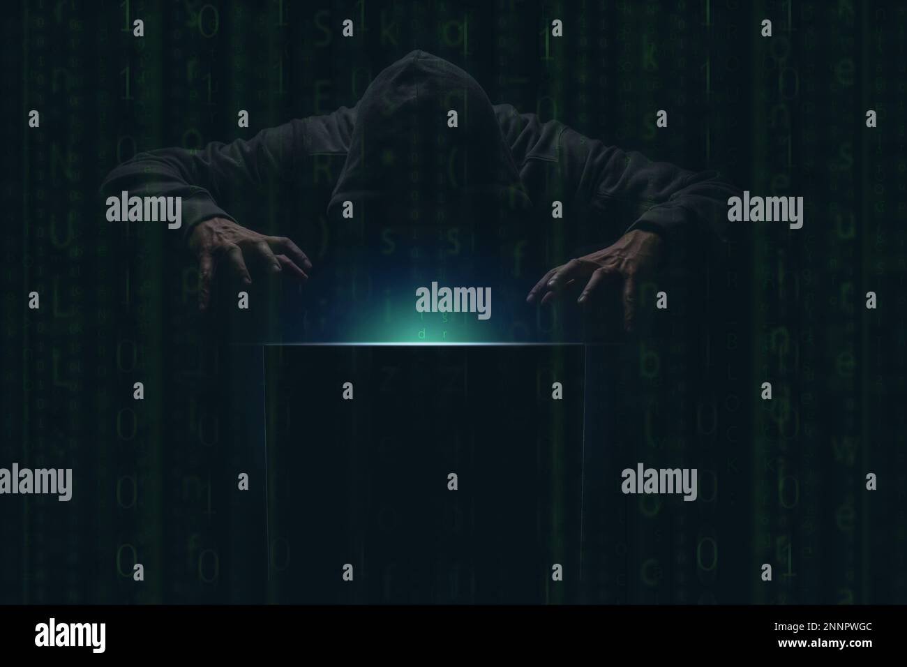 hacker over a screen with green binary code. Crime and Information Theft and Computers Stock ...