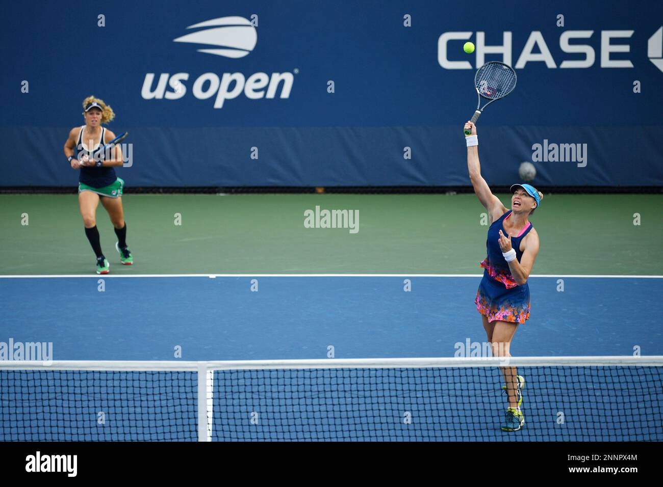 Laura Siegemund and Vera Zvonareva in action against Alexa Guarachi and ...